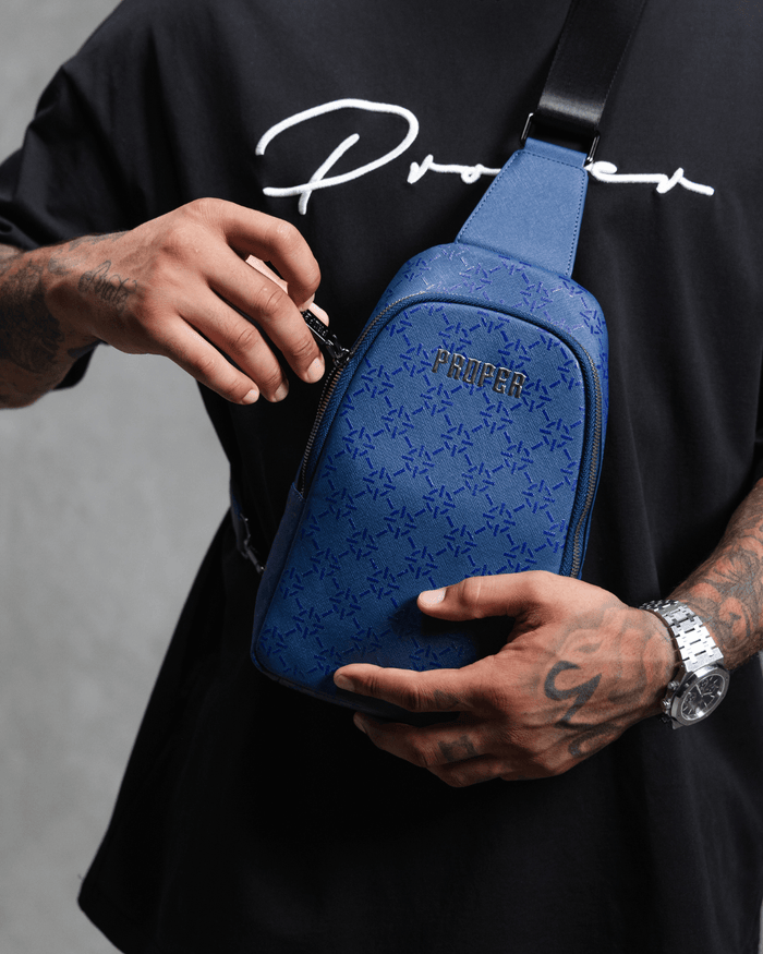 PROPER MONOGRAM SLING BAG BLUE
